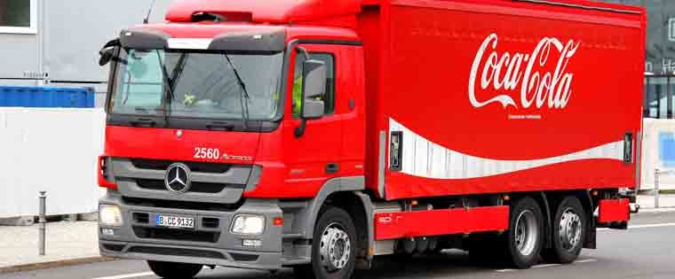 How does Coca Cola’s supply chain management adapt around the world?